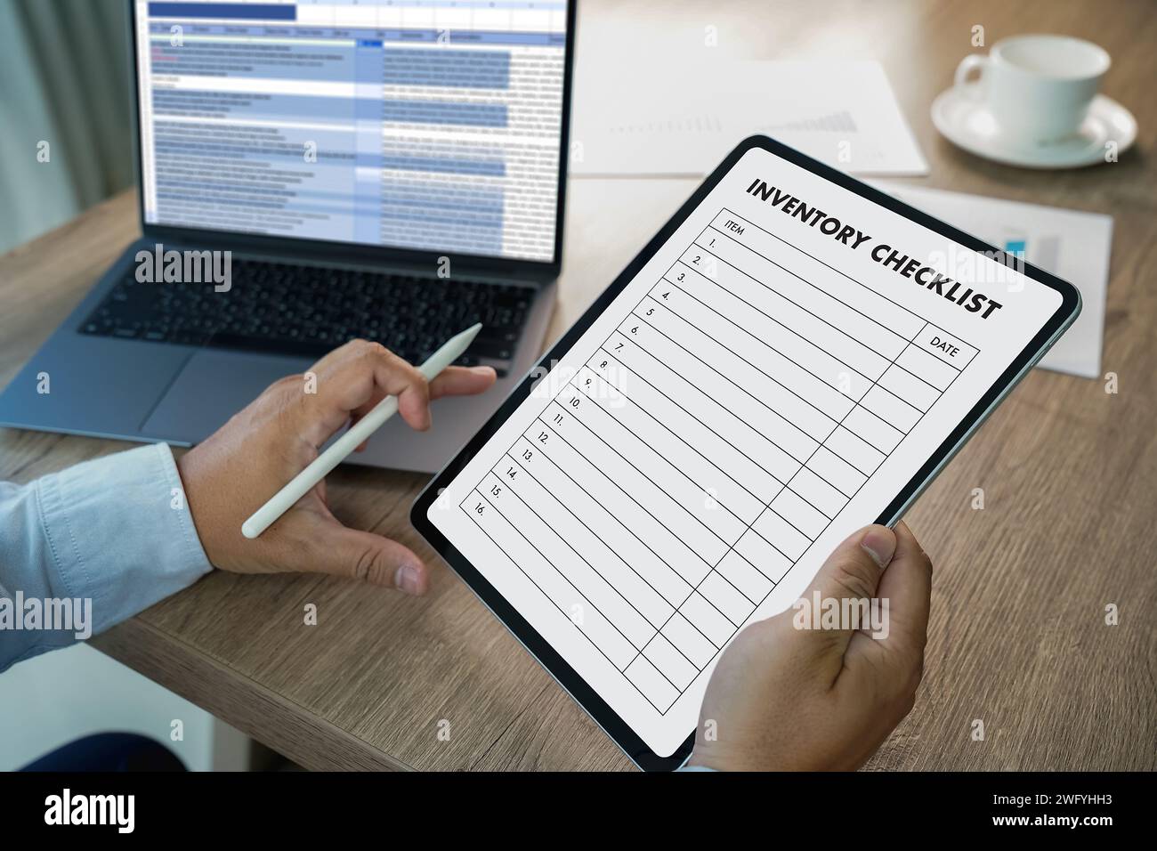 Warehouse professional checks inventory hi-res stock photography and ...