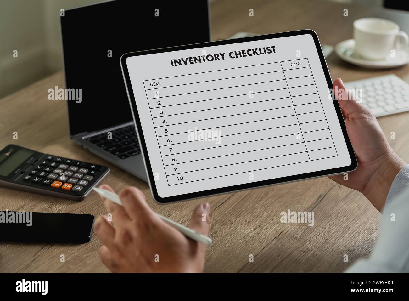 Warehouse professional checks inventory hi-res stock photography and ...