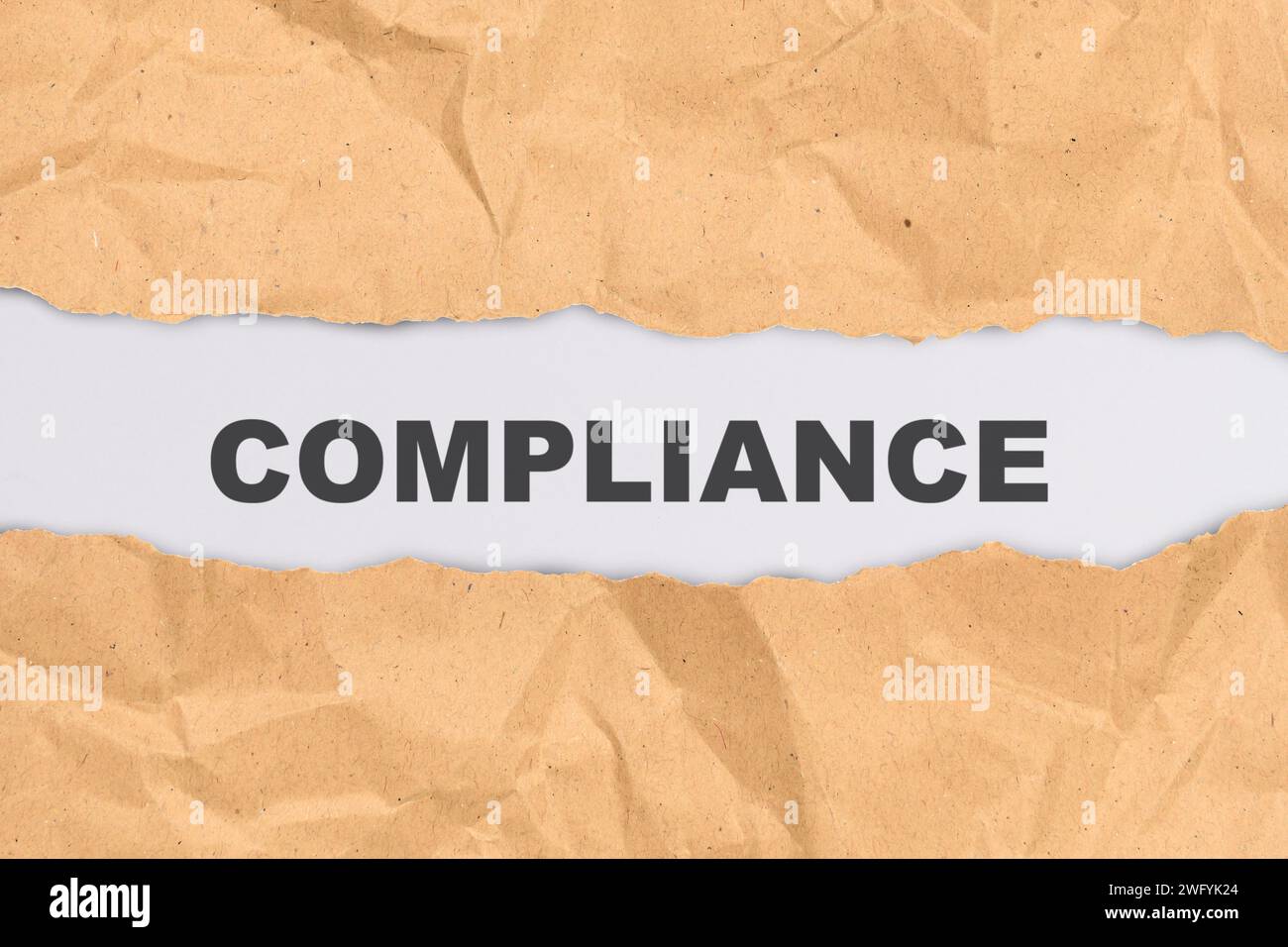 Ripped paper with compliance text over a white background. Compliance ...