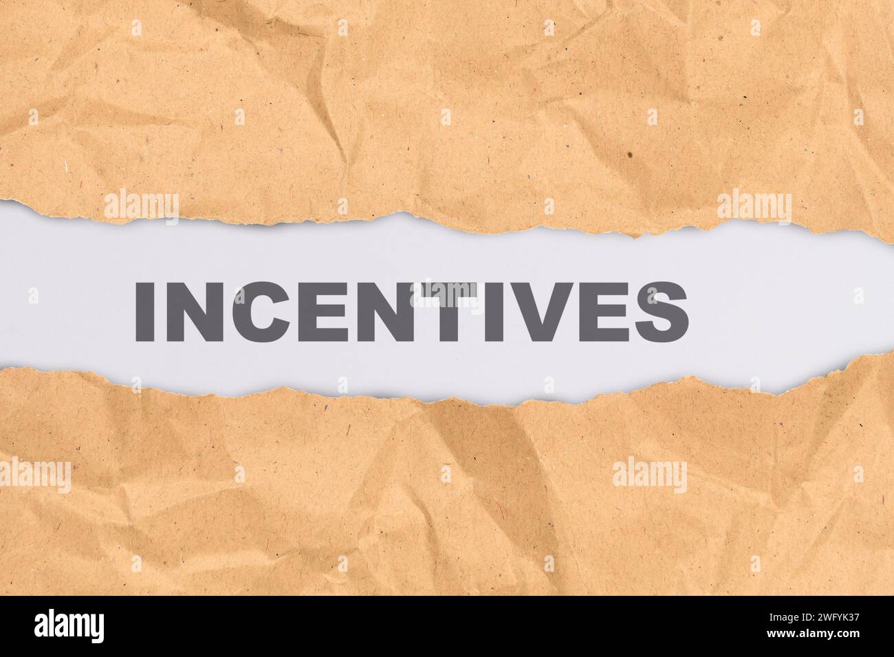 Ripped paper with incentive text over a white background. Business ...