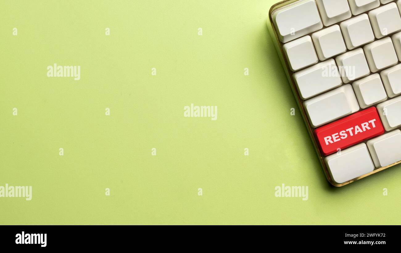 Keyboard button with restart text. New beginning of life, business or ...