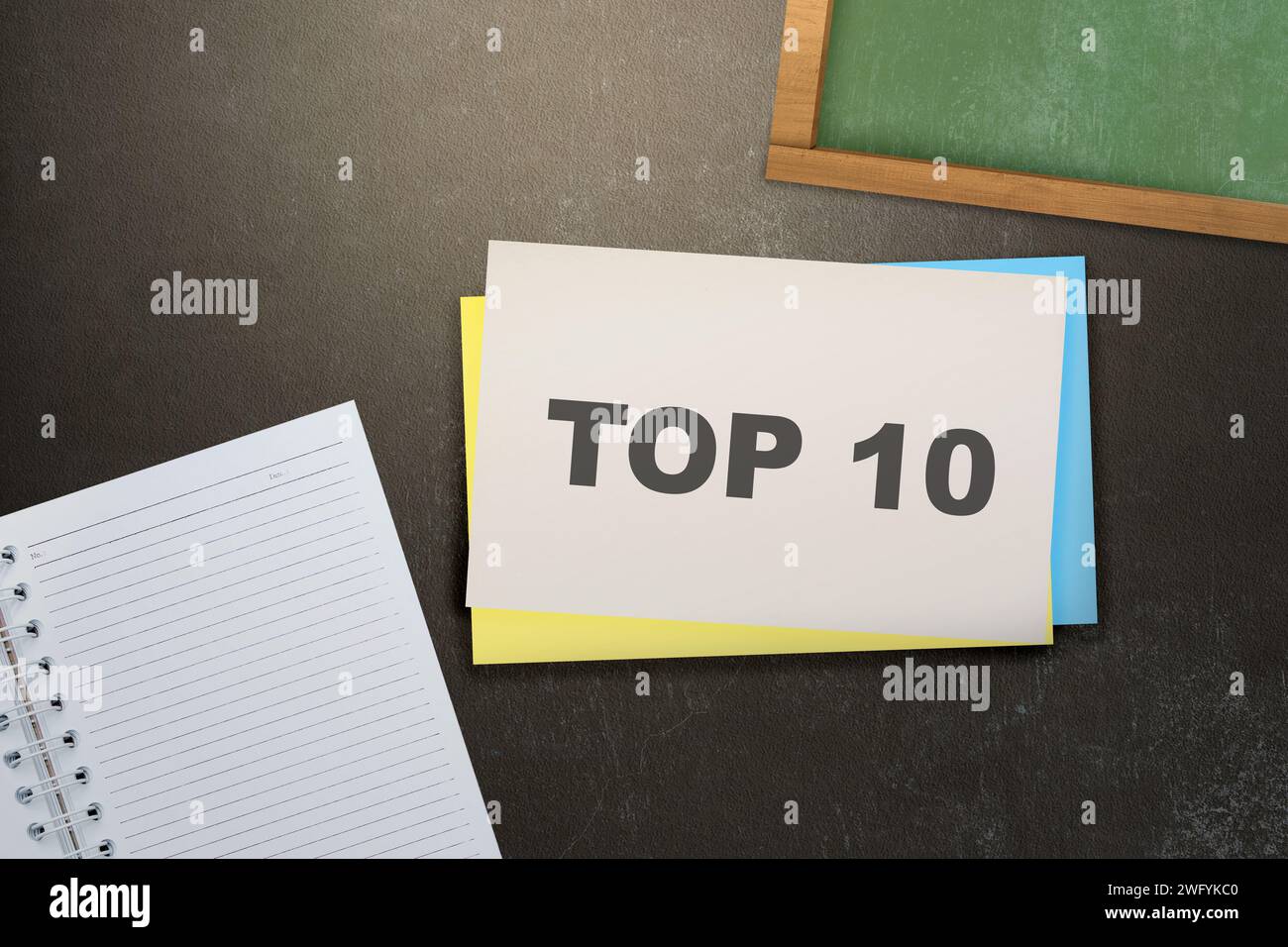 Stack of notes with the text of the top 10 over a colored background ...