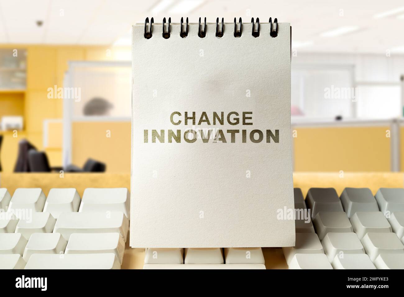 Notes with the text of change innovation on the keyboard. Change and ...
