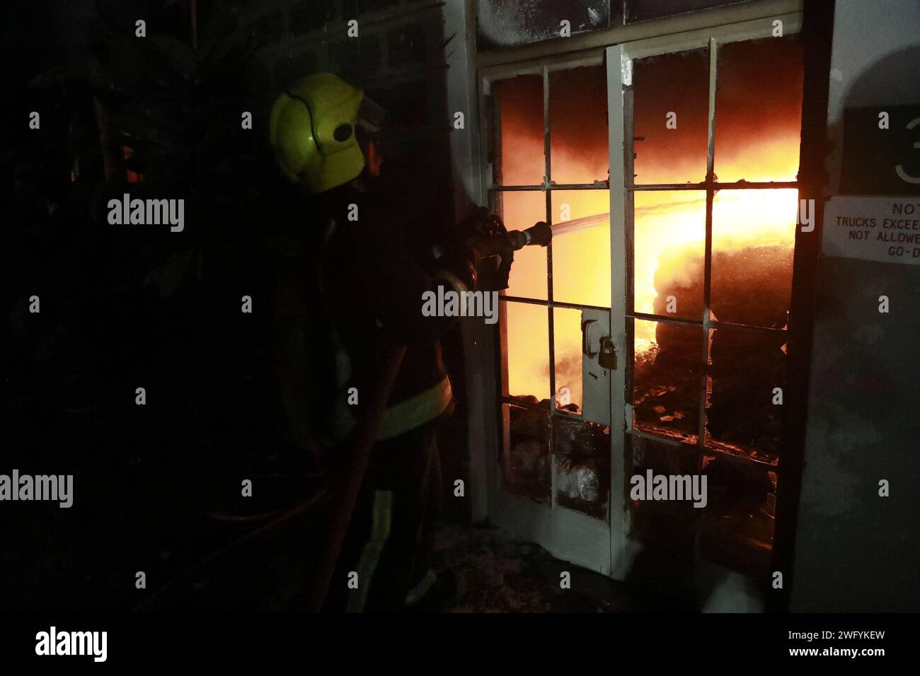 Firefighters put off a fire explosion at an industrial building in ...