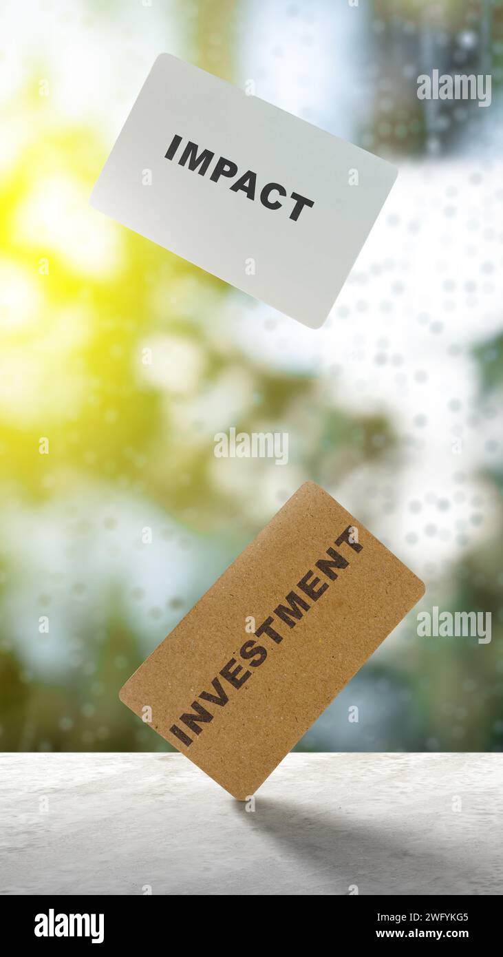 Falling card with impact investment text. Business impact concept Stock ...
