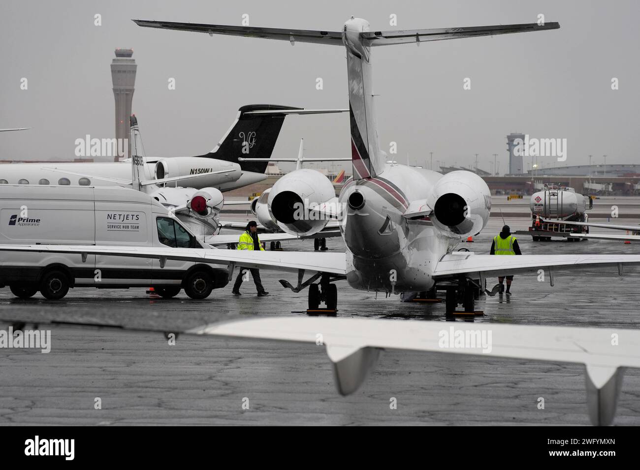 Planes are parked at a private jet terminal at Harry Reid International ...