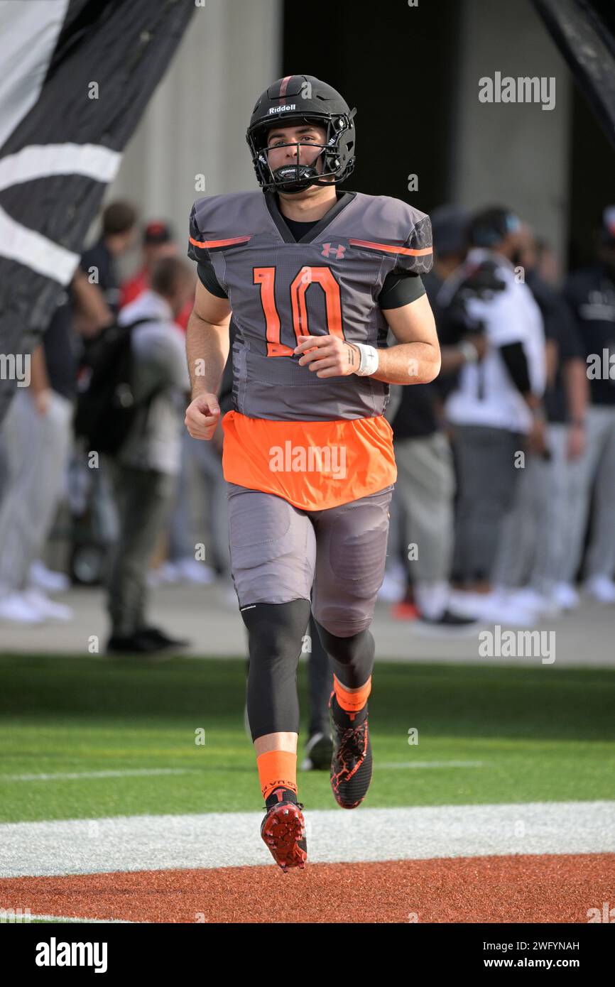 Team Fire quarterback Dante Reno (10) onto the field during player ...