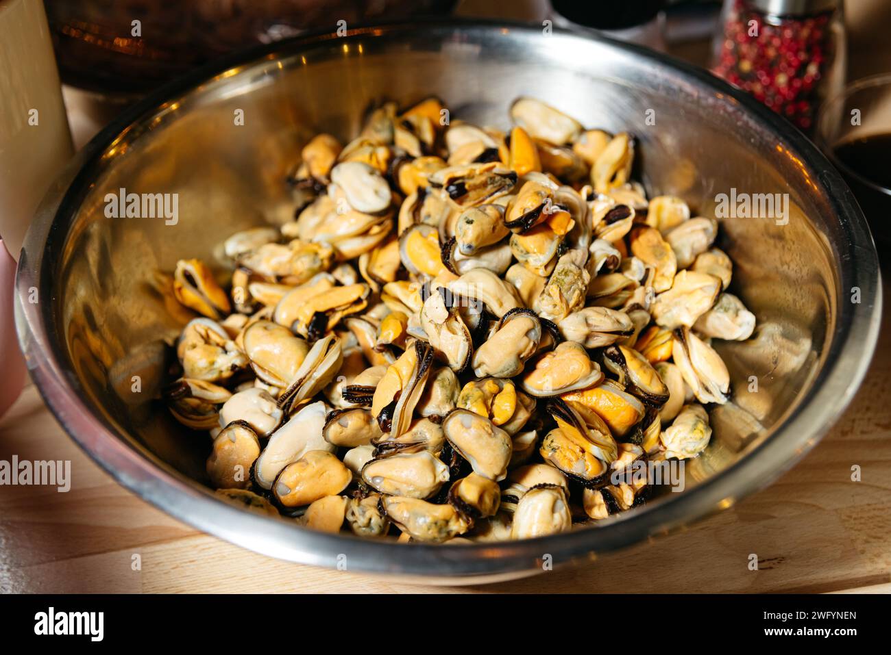 A bowl full of freshly cooked mussels, ready to be served as a ...