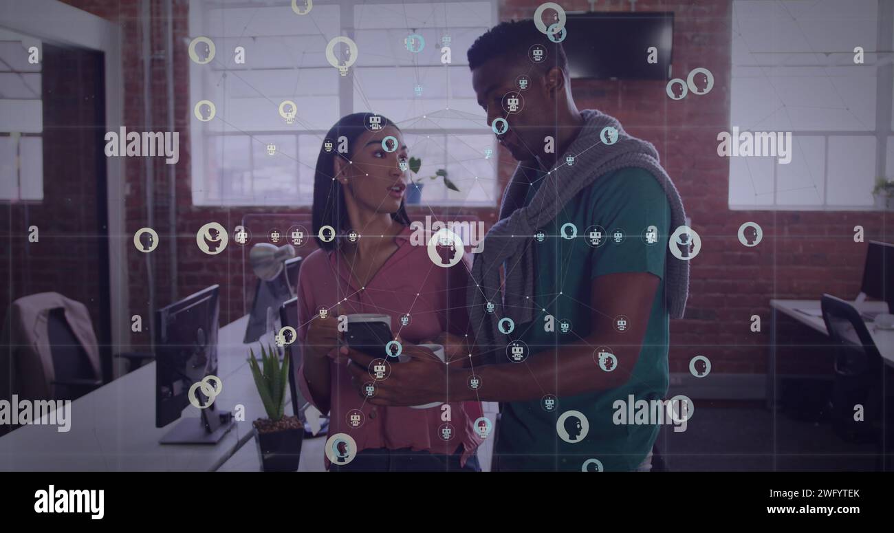 Image of ai icons and data processing over diverse business people in office Stock Photo - Alamy