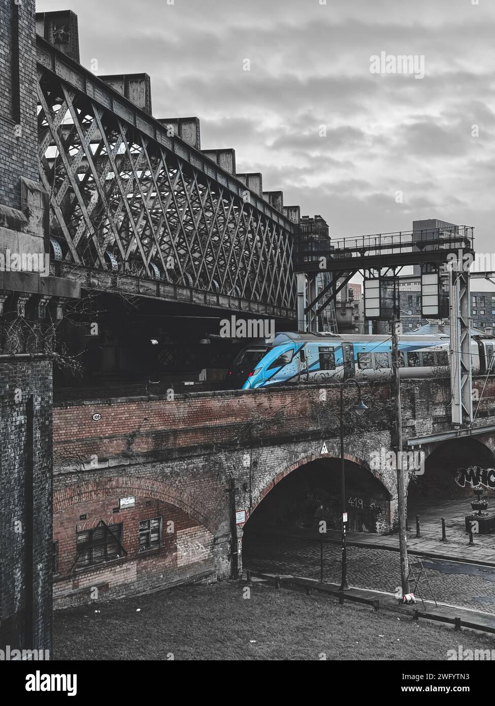 Train passing the viaduct of Castlefield in Greater Manchester Stock ...