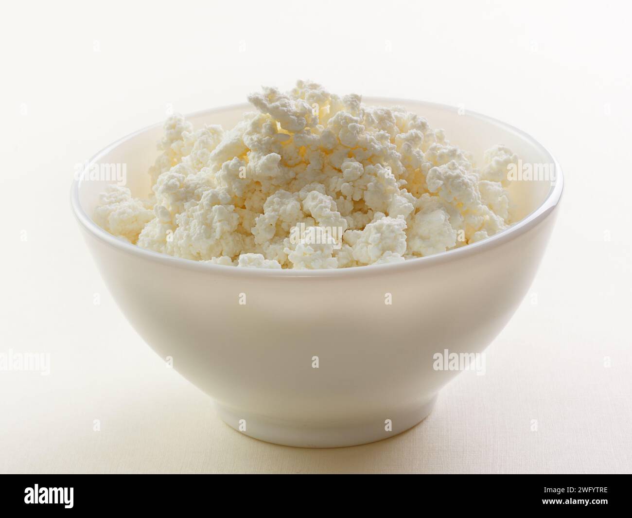 curd in ceramic bowl isolated white background Stock Photo - Alamy