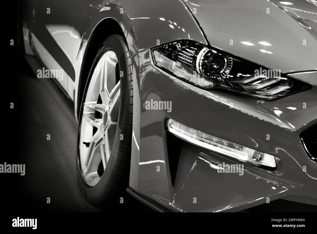 Front view of LED headlights sport car Stock Photo - Alamy