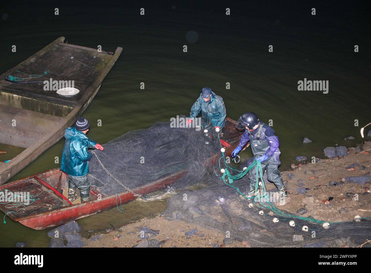 SUZHOU, CHINA - FEBRUARY 2, 2024 - Fishermen catch fish at the Cheng ...