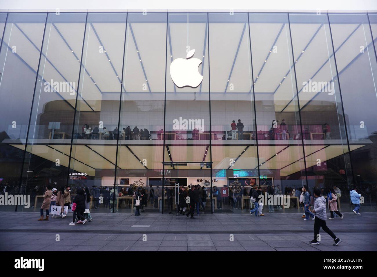 HANGZHOU, CHINA - FEBRUARY 2, 2024 - Visitors walk past the Apple ...