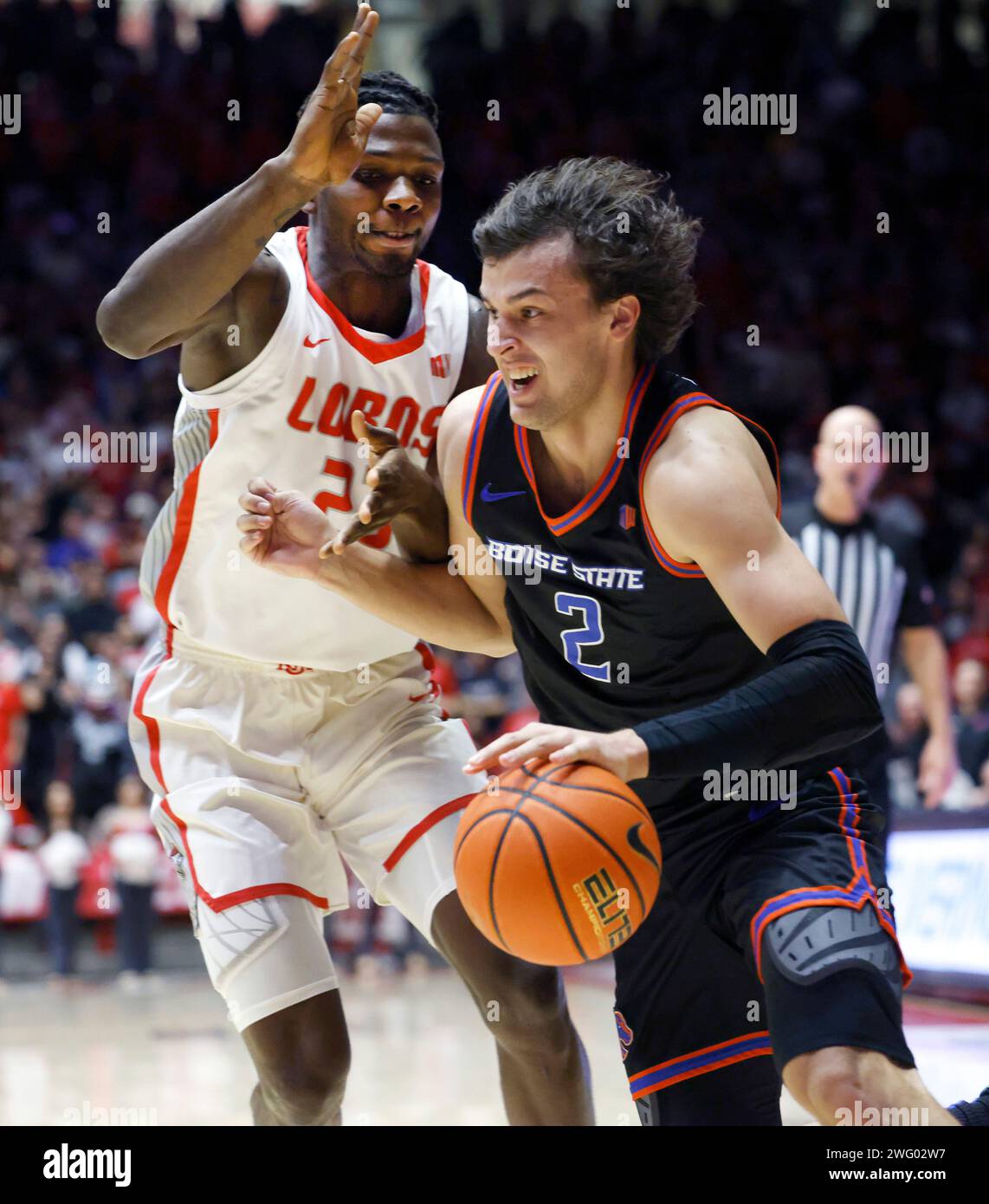Boise State forward Tyson Degenhart dribbles the ball past New Mexico ...