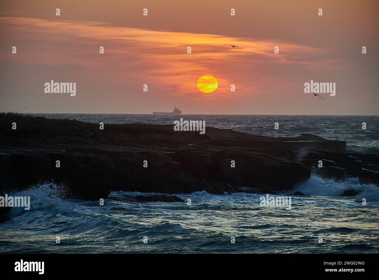 Sunrise Over Church Point Newbiggin by the Sea Stock Photo - Alamy