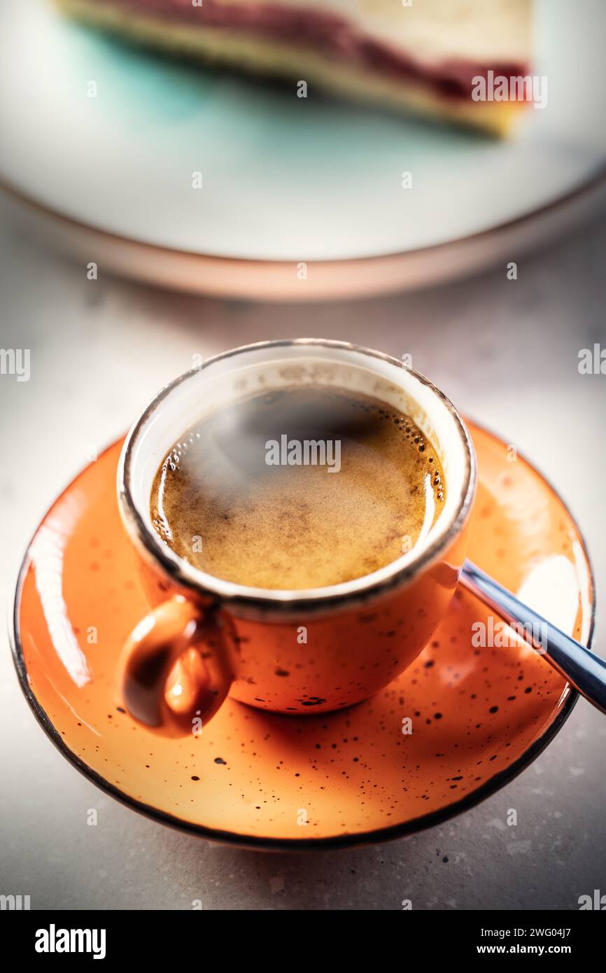Traditional ristretto coffee with cake on cafe table Stock Photo - Alamy