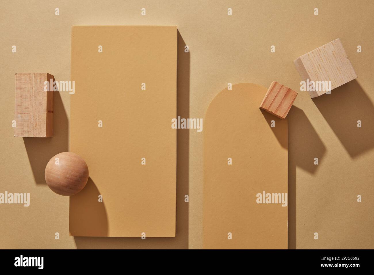 Many wooden square podiums arranged in a flat layout surrounding a ...