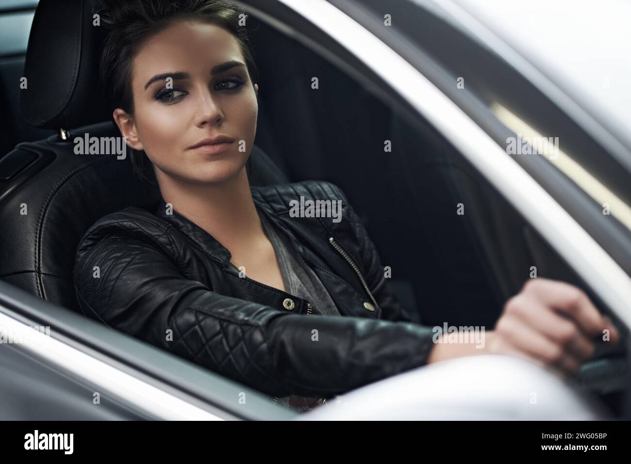 Woman, car and thinking while driving for a roadtrip adventure in a ...