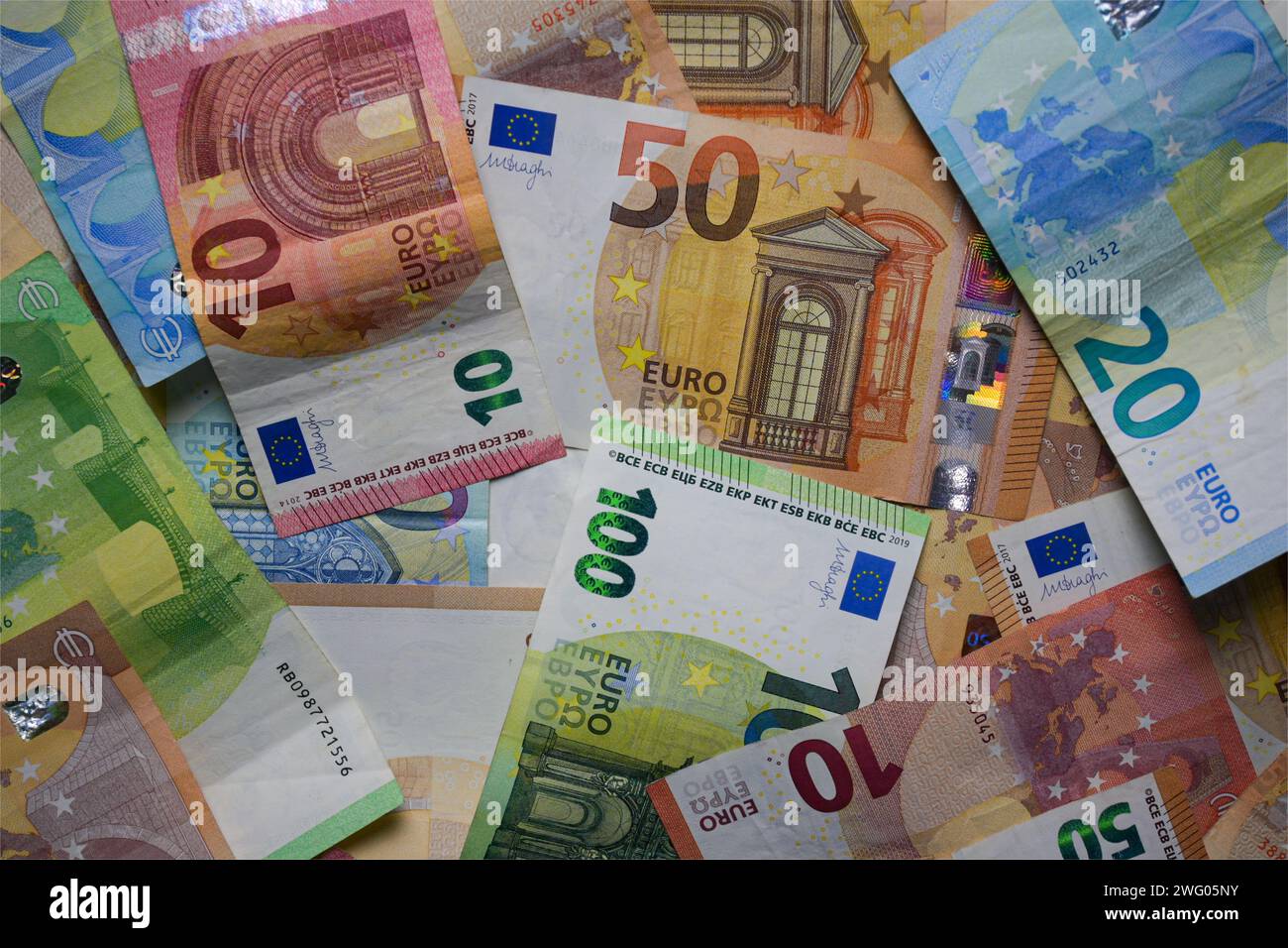 a large pile of euro banknotes - 10, 20, 50, 100 euros Stock Photo - Alamy