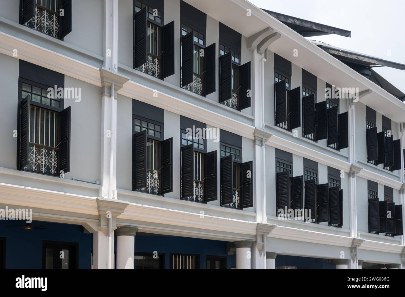 Front view of vintage traditional Singapore shop house with black ...