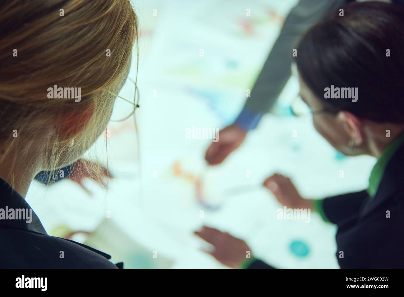 CEO optimization. Employees, colleagues looking on analytical papers ...