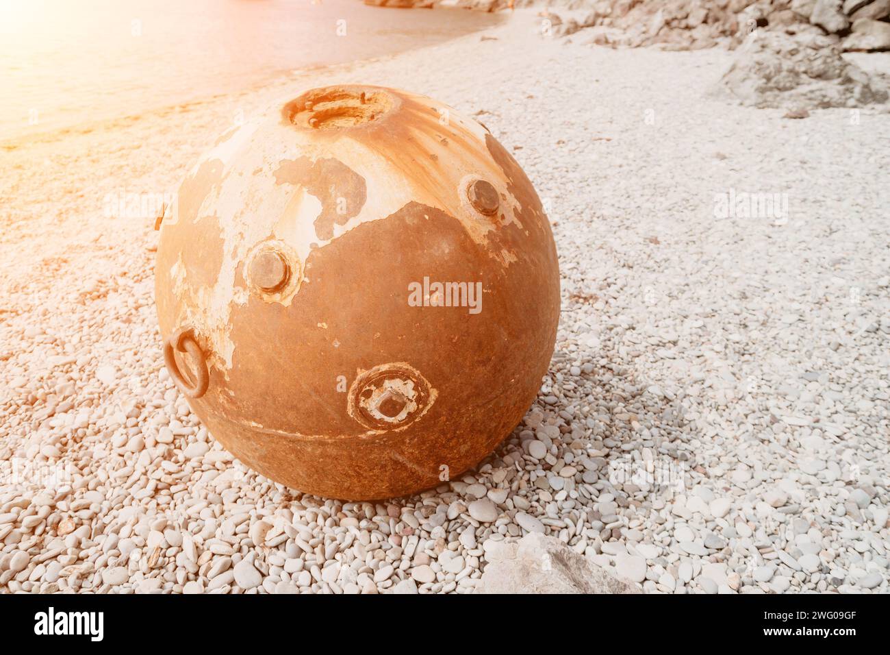 Old rusty sea mine on the beach Stock Photo - Alamy