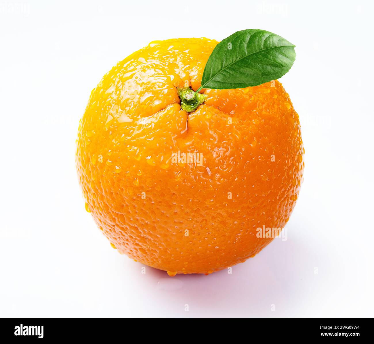 orange with leaf isolated white background Stock Photo - Alamy