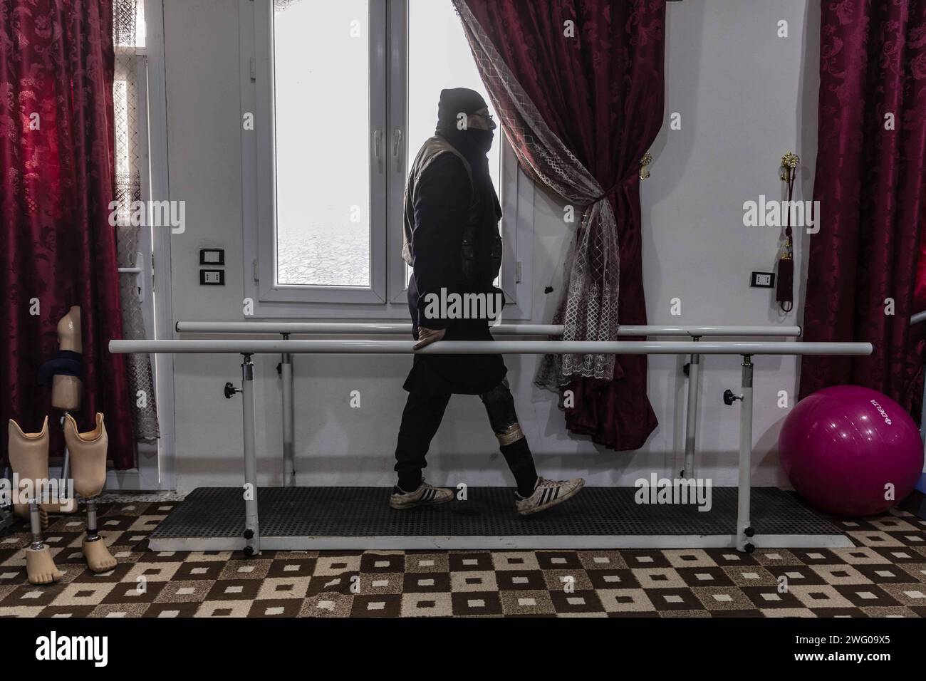 Idlib, Syria. 01st Feb, 2024. A man with foot amputations trains on ...