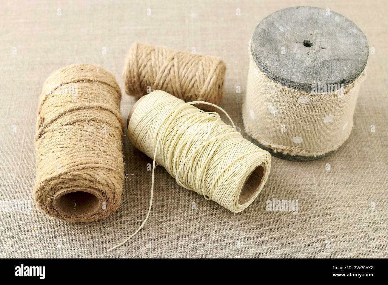 Jute strings and linen ribbon. Hobby time Stock Photo - Alamy