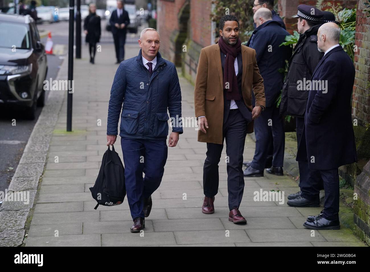 Rob Rinder (left) and Sean Fletcher attend the funeral service of Derek ...