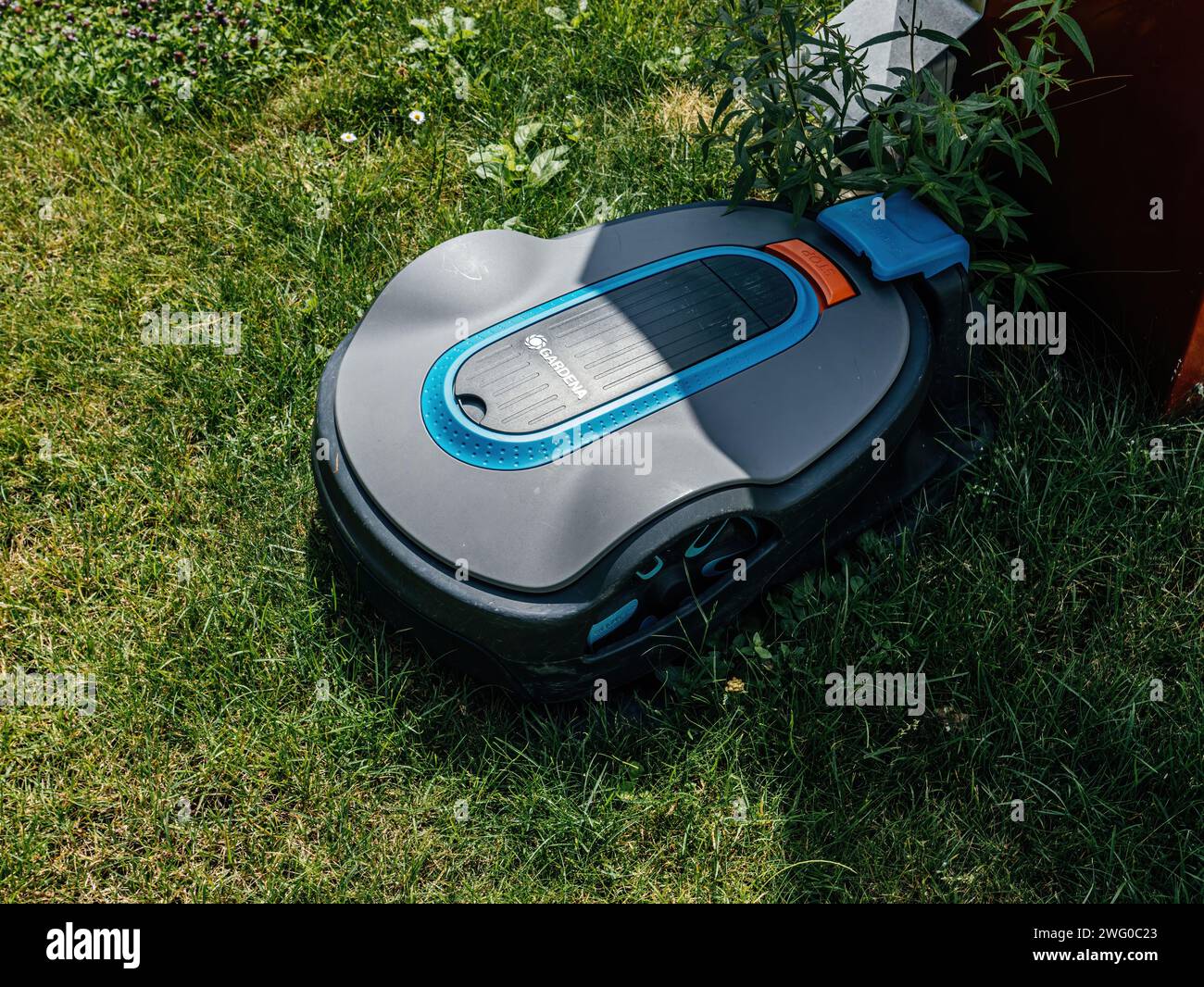 Germany - Jul 2, 2023: Gardena Autonomous robotic lawn mower cutting ...