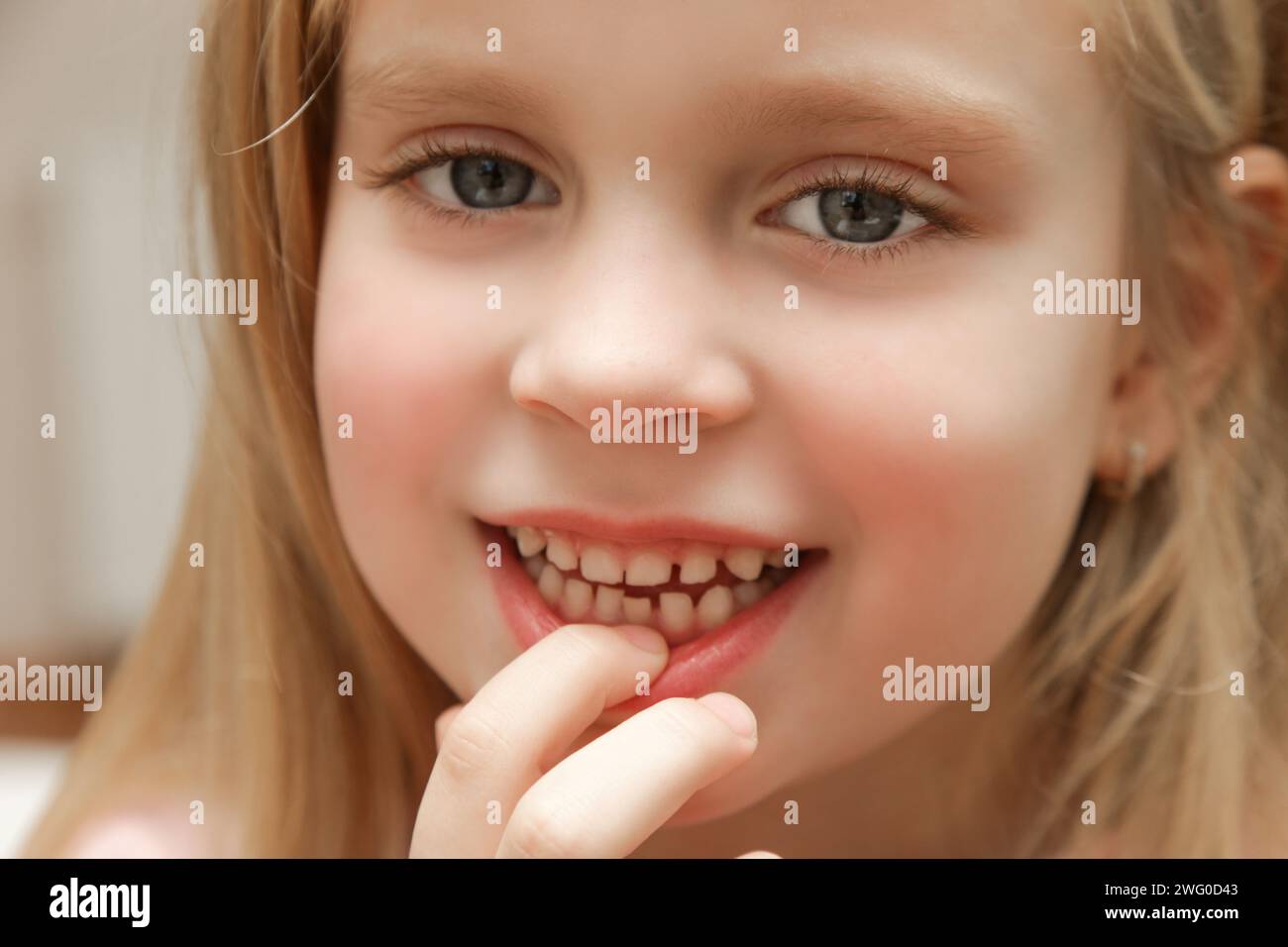 Baby with first tooth hi-res stock photography and images - Alamy