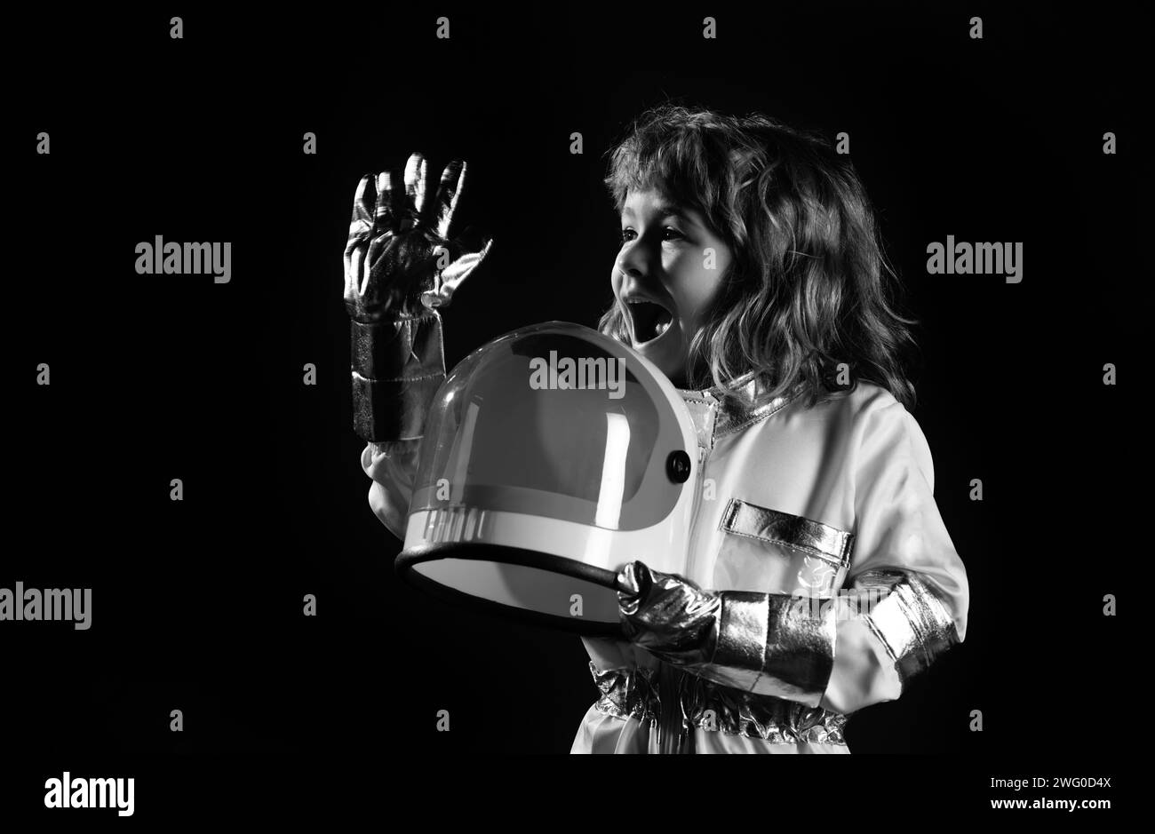 Space kids cosmonaut concept. Portrait of positive little boy wearing ...