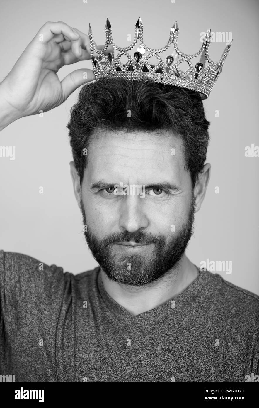 Young Man With Golden Crown Of King Over Gray Background Handsome Man Wearing King Crown Stock