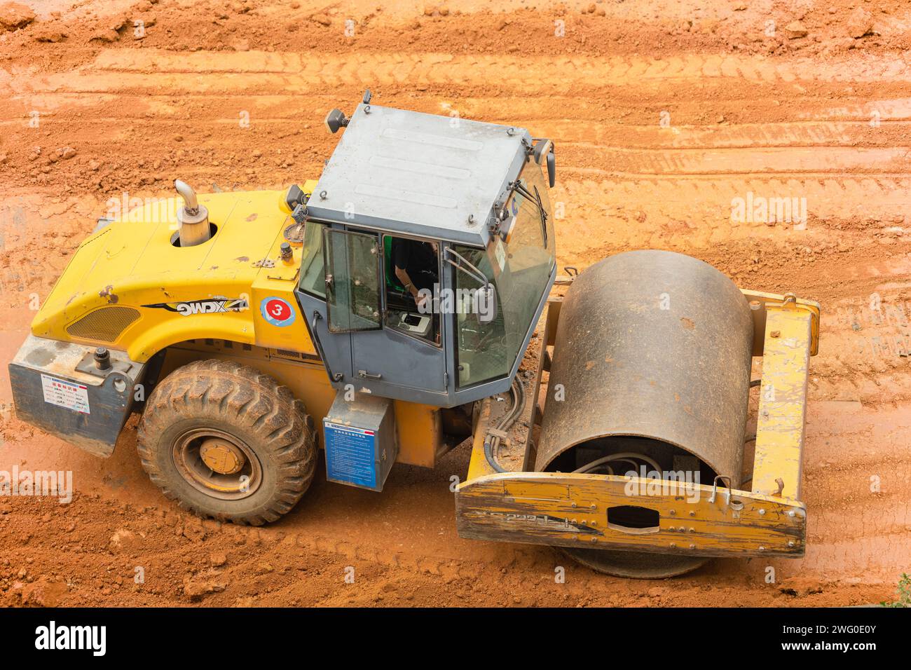 Excavator digging the land Stock Photo - Alamy
