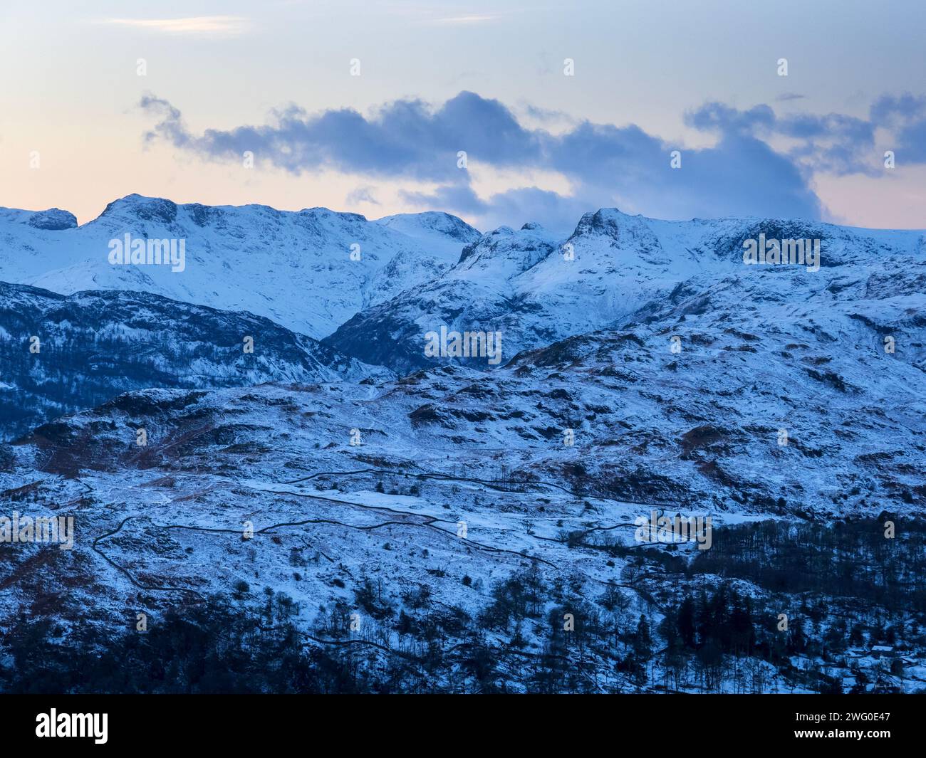 Snow on the Langdale Pikes and Bow Fell at sunset from Ambleside, Lake ...