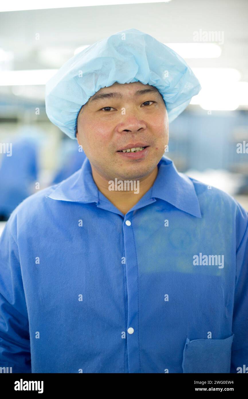 Short chinese man hi-res stock photography and images - Alamy