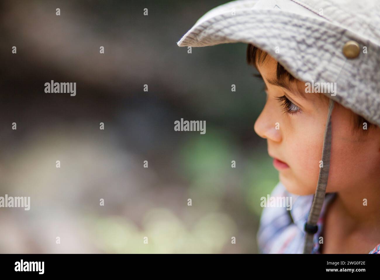 A seven year old boy wearing a hat Stock Photo - Alamy