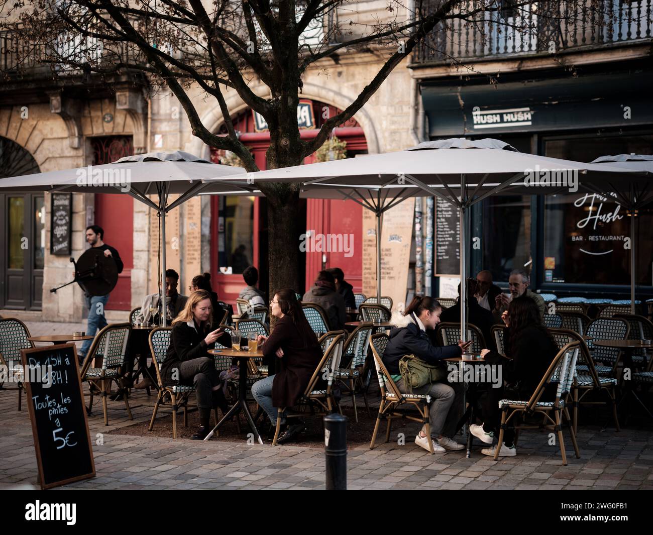 Daily life as seen in the streets of Bordeaux on a sunny winter's day ...