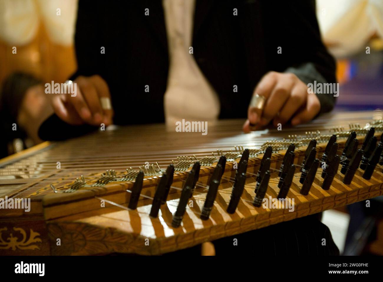 A Turkish musician playing his Kanun Stock Photo - Alamy
