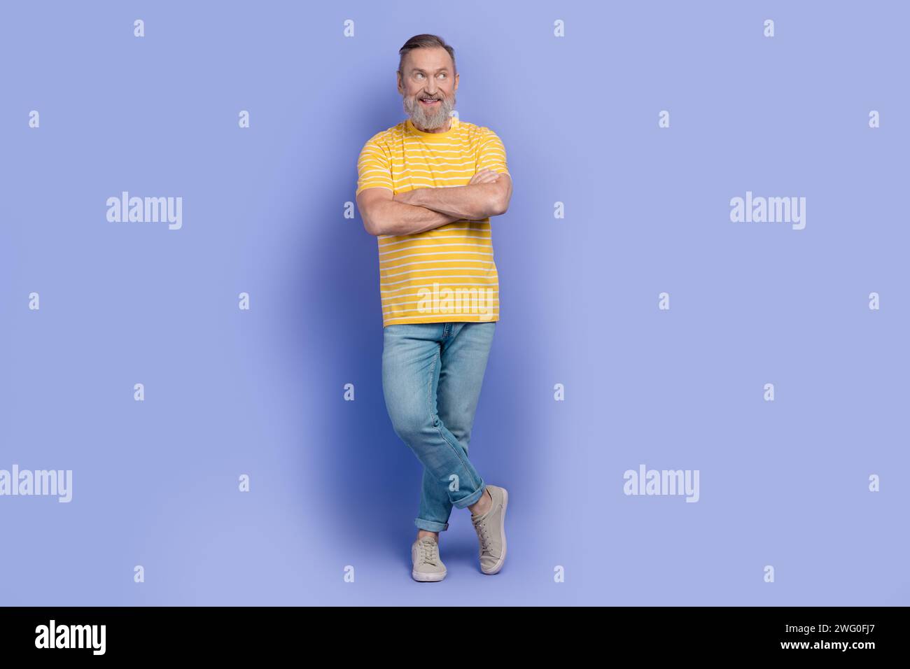 Full body portrait of creative minded aged man folded arms look empty ...