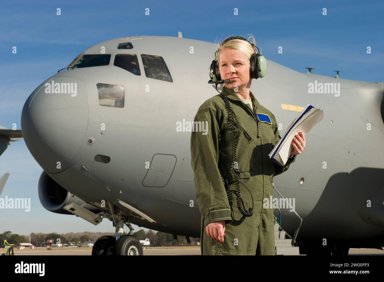 A U.S. Air Force loadmaster conducts a preflight checklist during ...