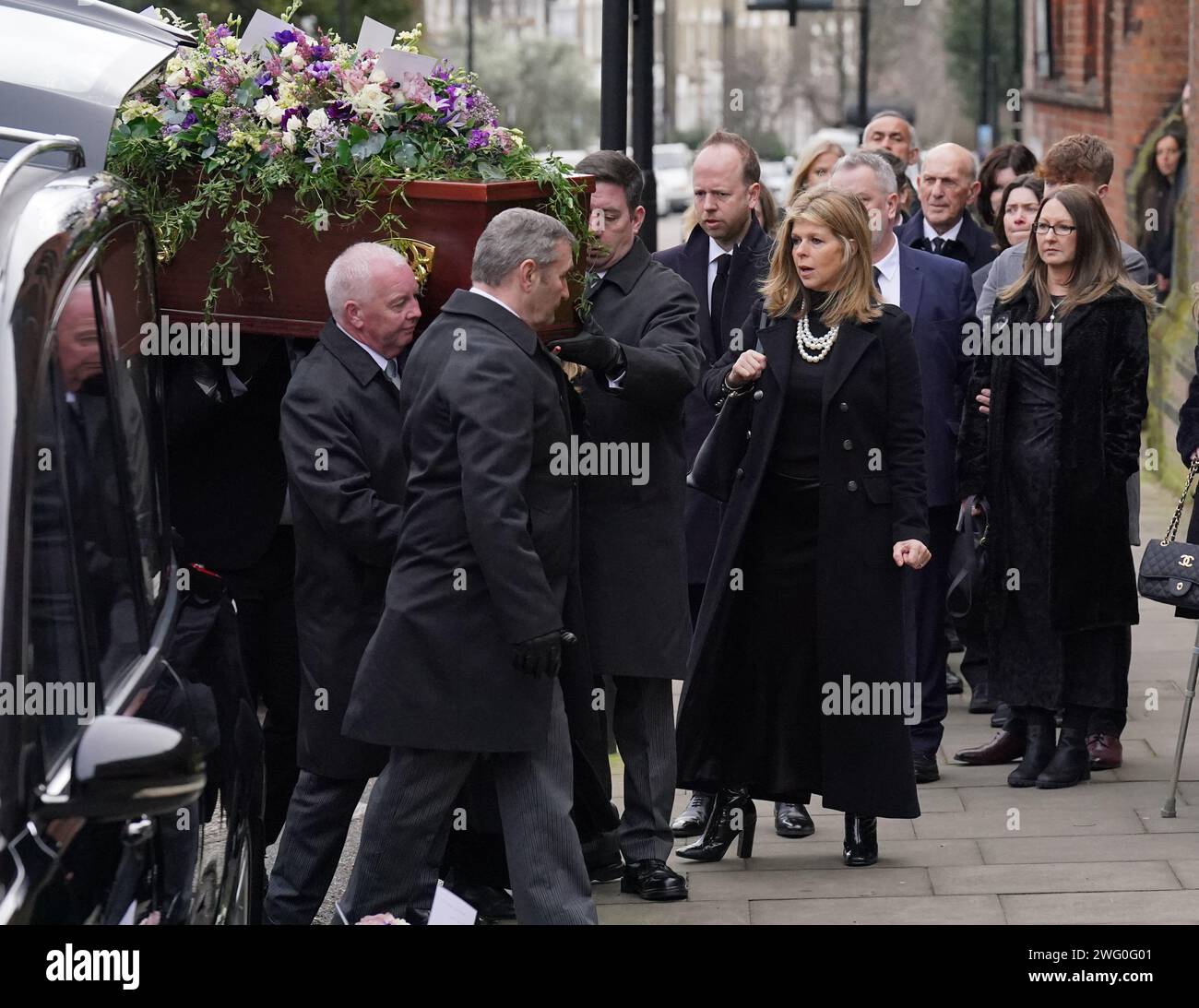 Kate Garraway accompanies the coffin into the funeral service of her ...