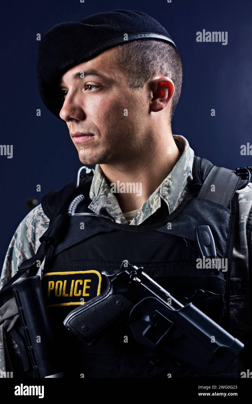 A Latino, male, Air Force Security Forces Airman in uniform poses with ...