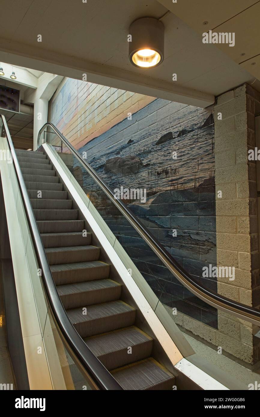 View from the bottom of an escalator Stock Photo - Alamy
