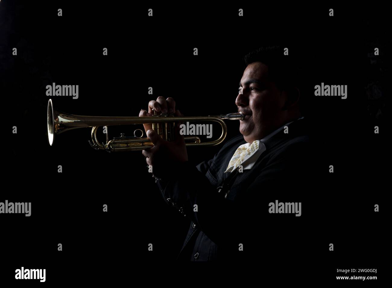 Mexican playing trumpet hi-res stock photography and images - Alamy