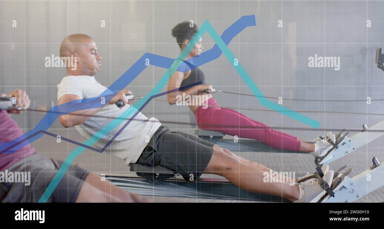 Image of graph processing data over diverse men and woman training on ...