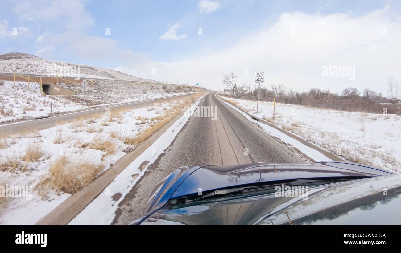 Driving on Suburban Road Post-Winter Storm Stock Photo - Alamy