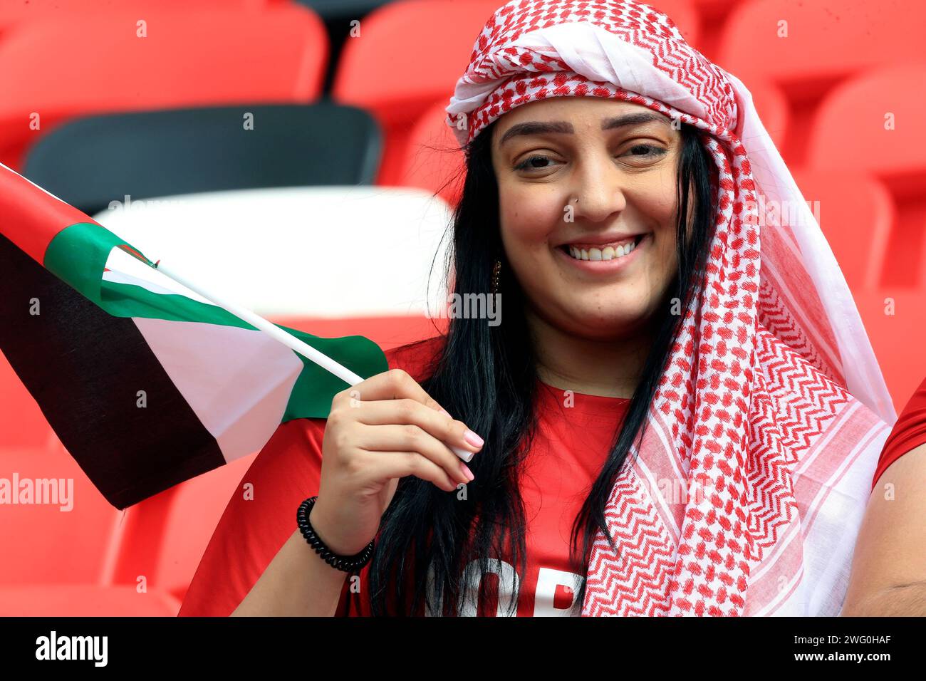 A Jordanian fan attends the quarterfinal soccer match between ...
